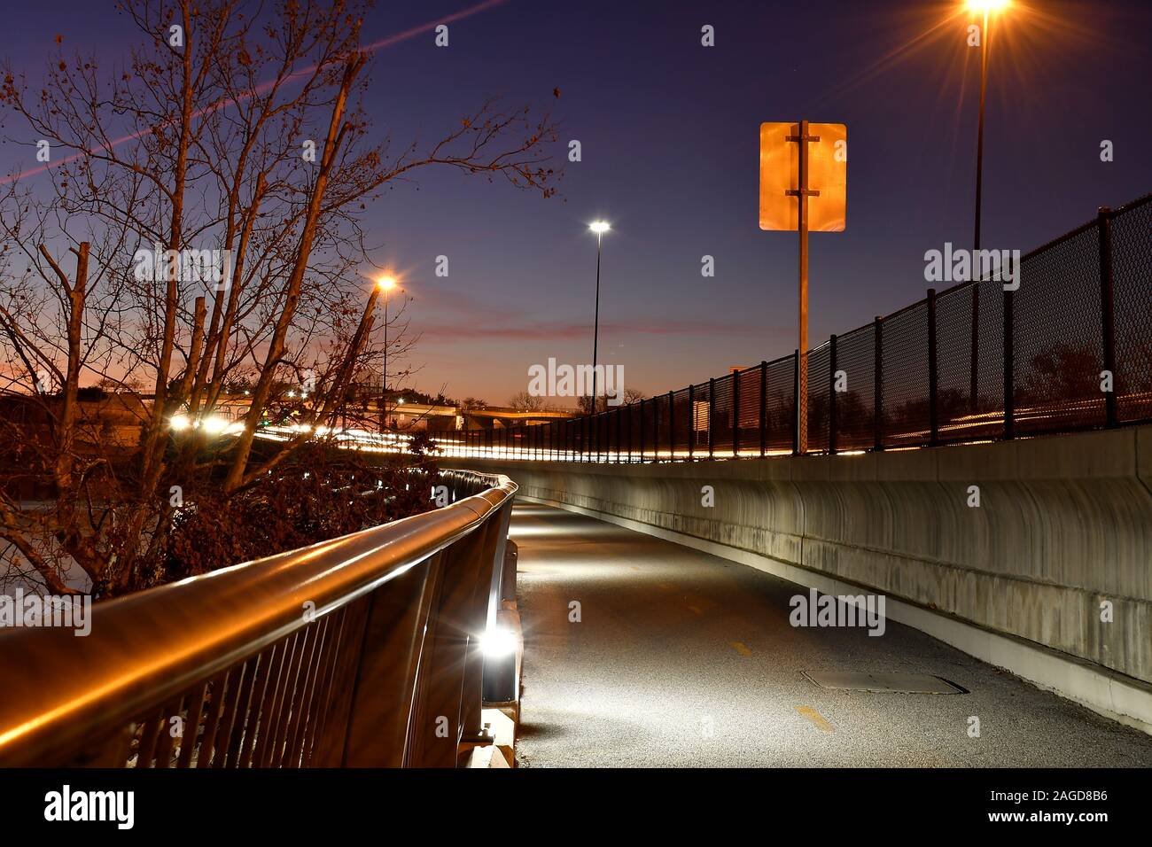 Walking running and biking path lighted at night Stock Photo - Alamy