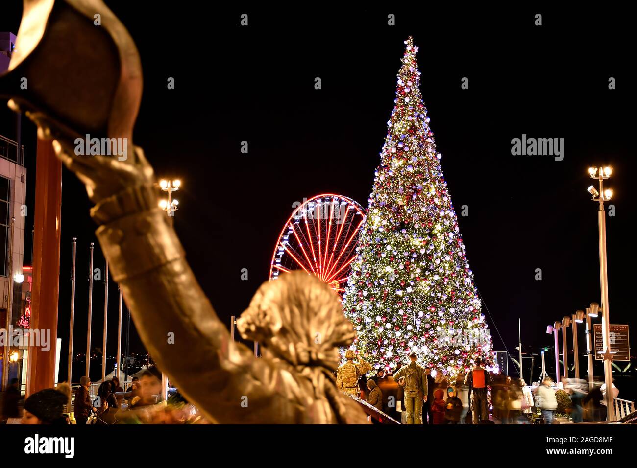 National Harbor Christmas Tree with statue Washington in foreground and ...