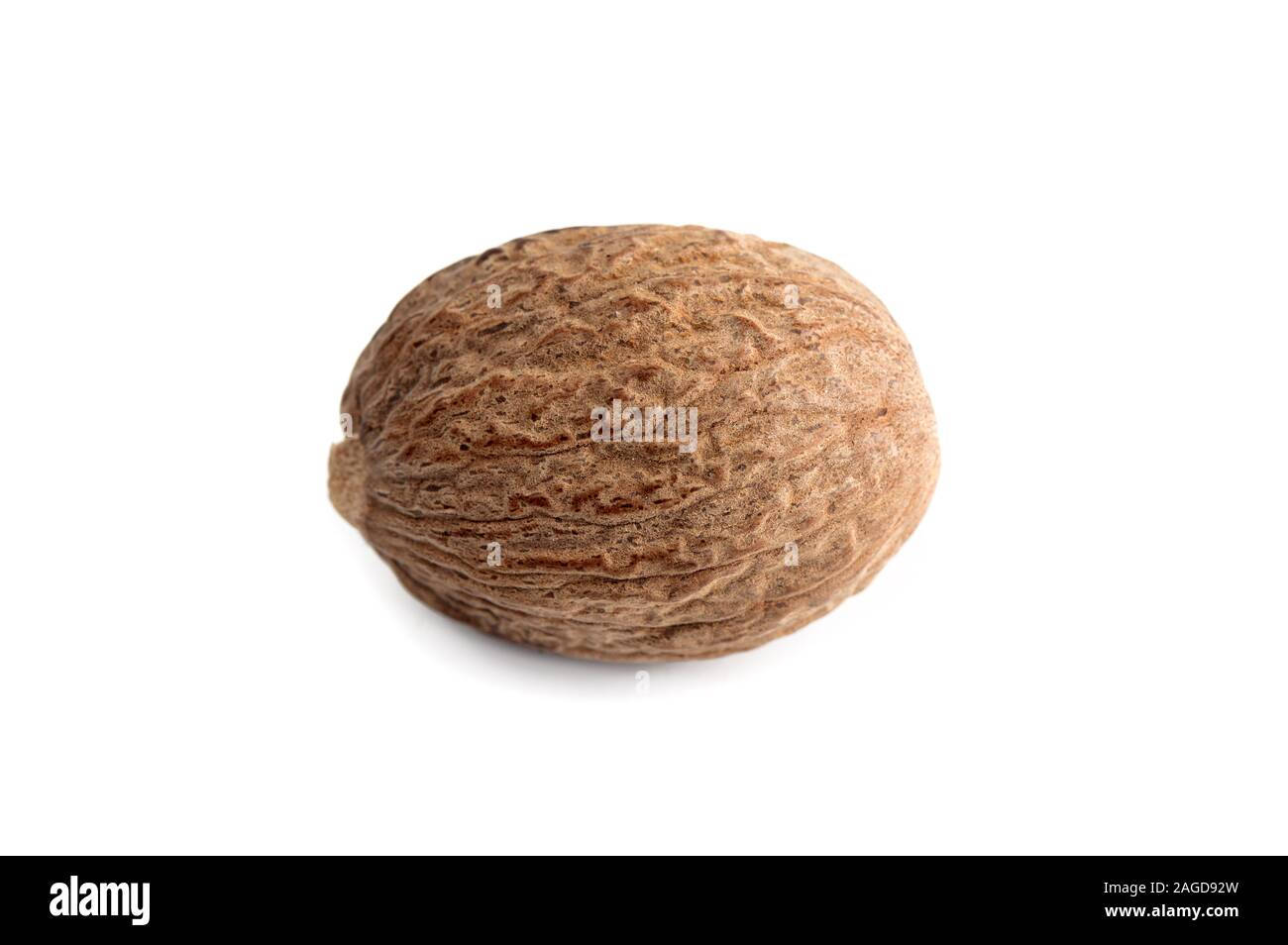 Nutmeg isolated on white background. Close up Stock Photo - Alamy