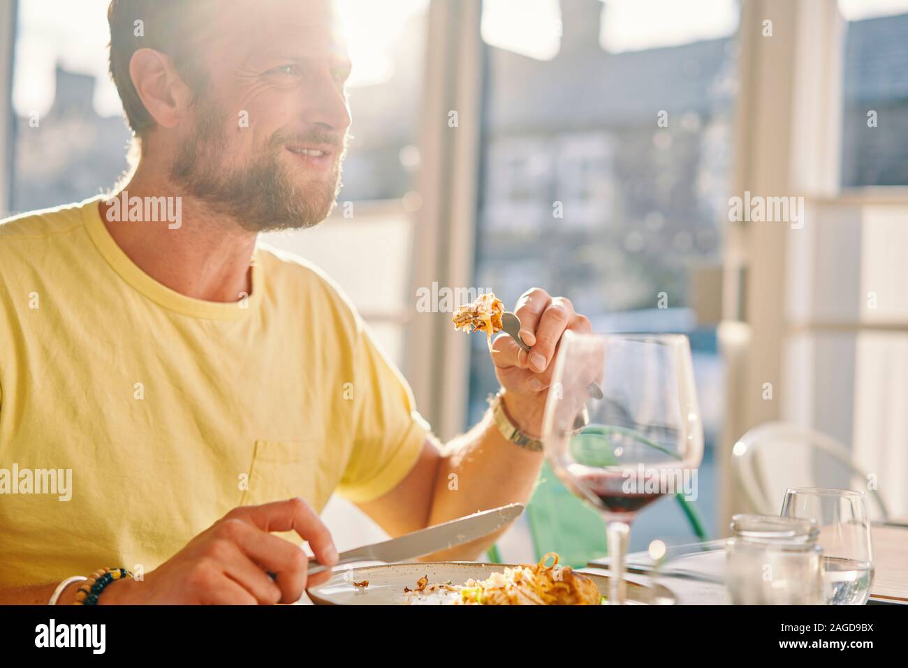 Man having meal in restaurant Stock Photo - Alamy