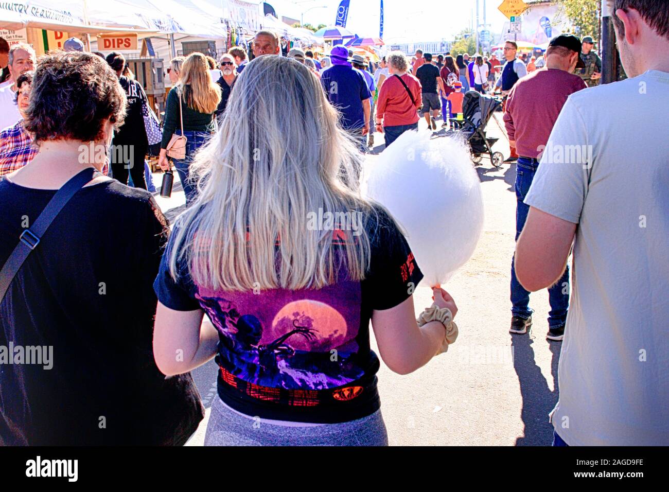 Young woman eating sugar candy hi-res stock photography and images - Alamy