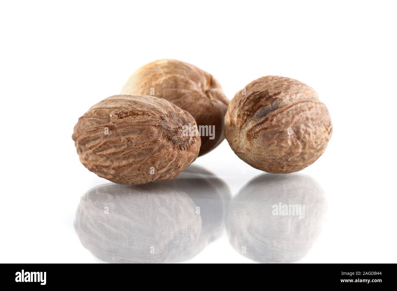 Nutmeg isolated on white background. Close up Stock Photo - Alamy