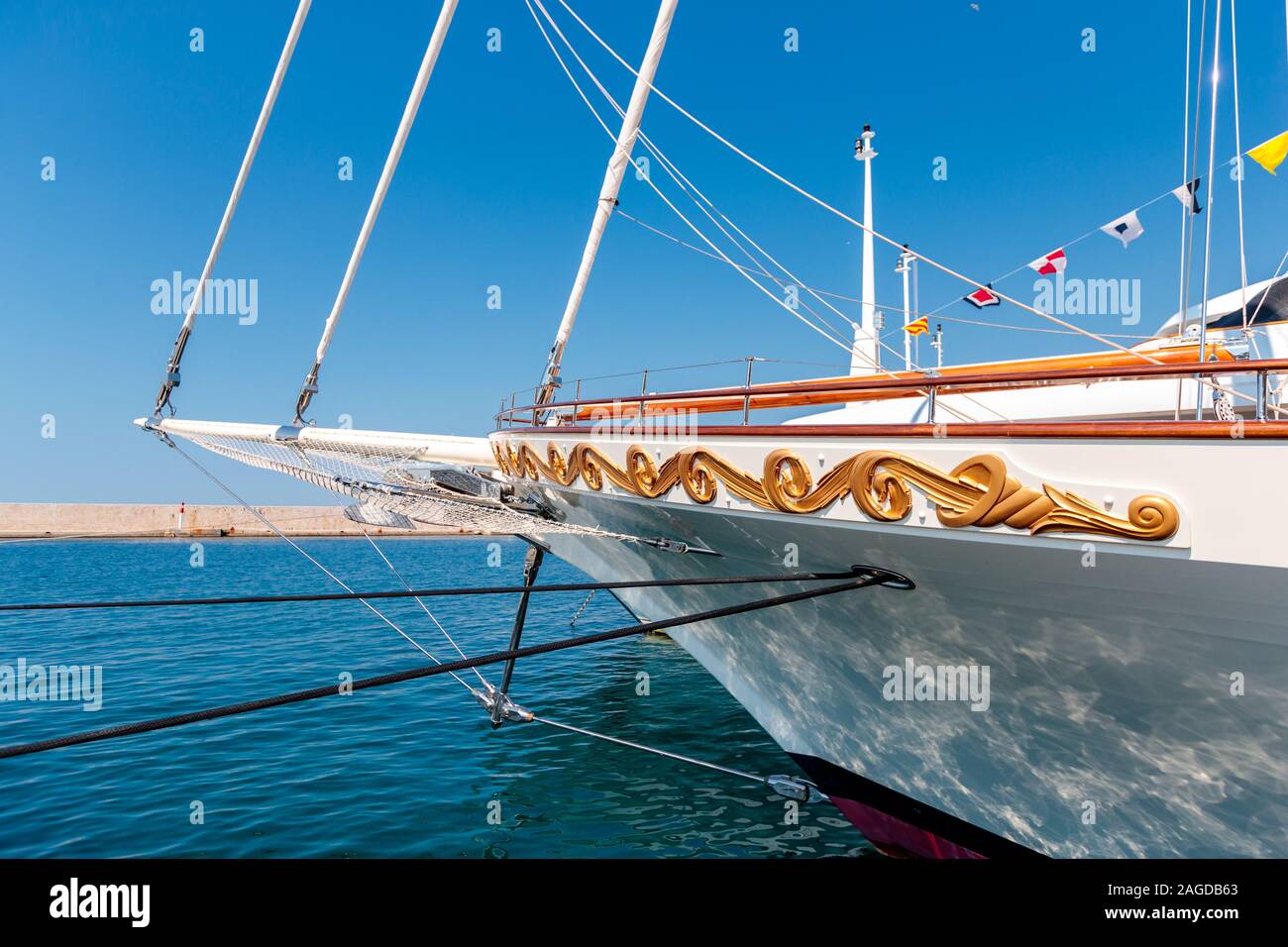 Beautiful schooner with golden patterns sailing in the ocean Stock ...