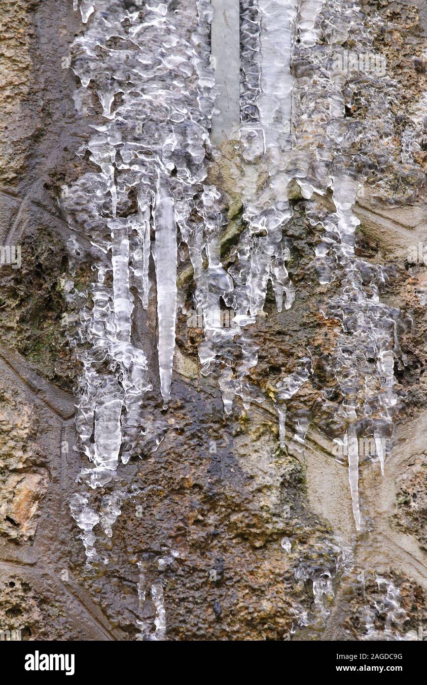 Cold winter weather freeze water in icicles Stock Photo - Alamy