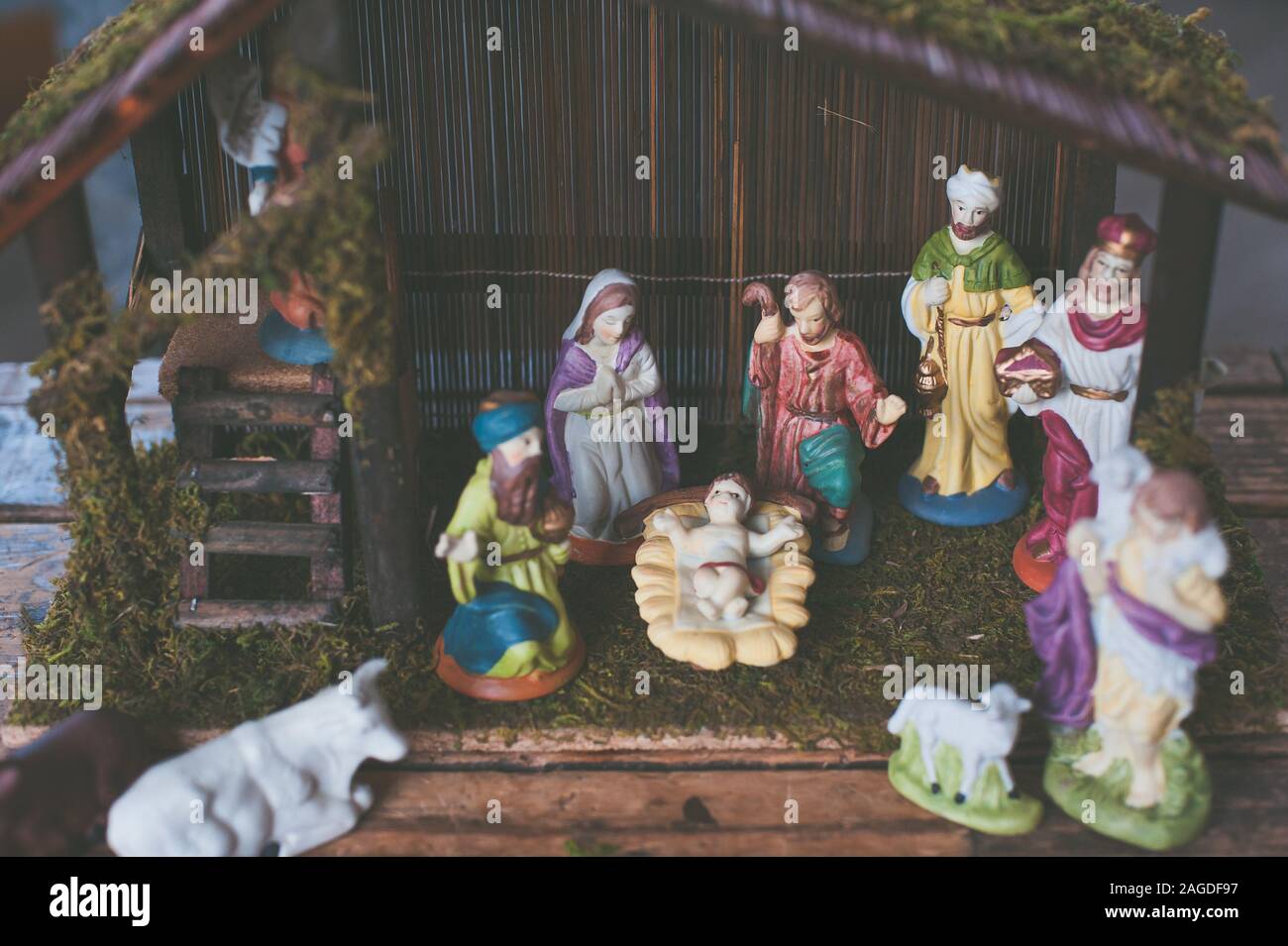 Closeup shot of small Christmas holy figures demonstrating the birth of ...