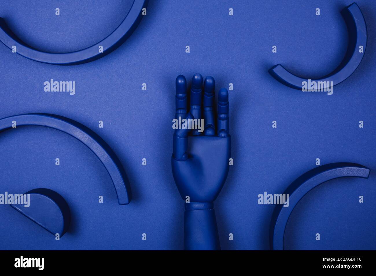 Blue hand with abstract 3d forms. Concept of demonstrating color of the ...