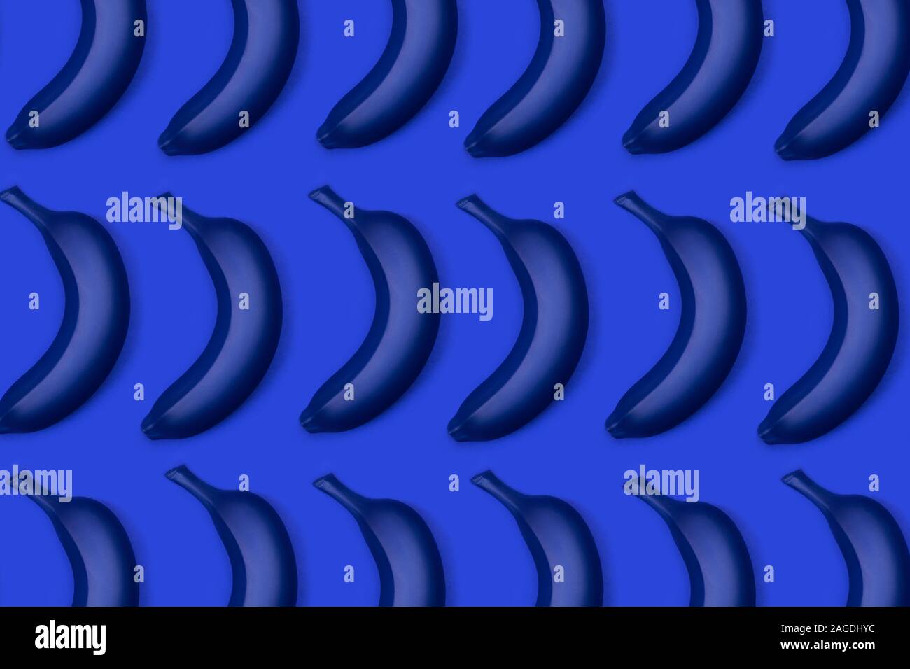 Group of blue bananas as a pattern. Flat lay style. Monochrome trendy ...