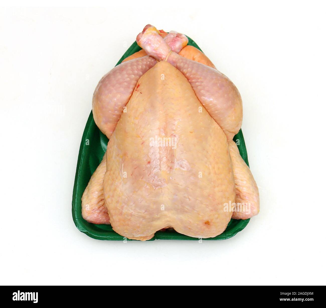 Raw whole chicken meat on white background Stock Photo - Alamy