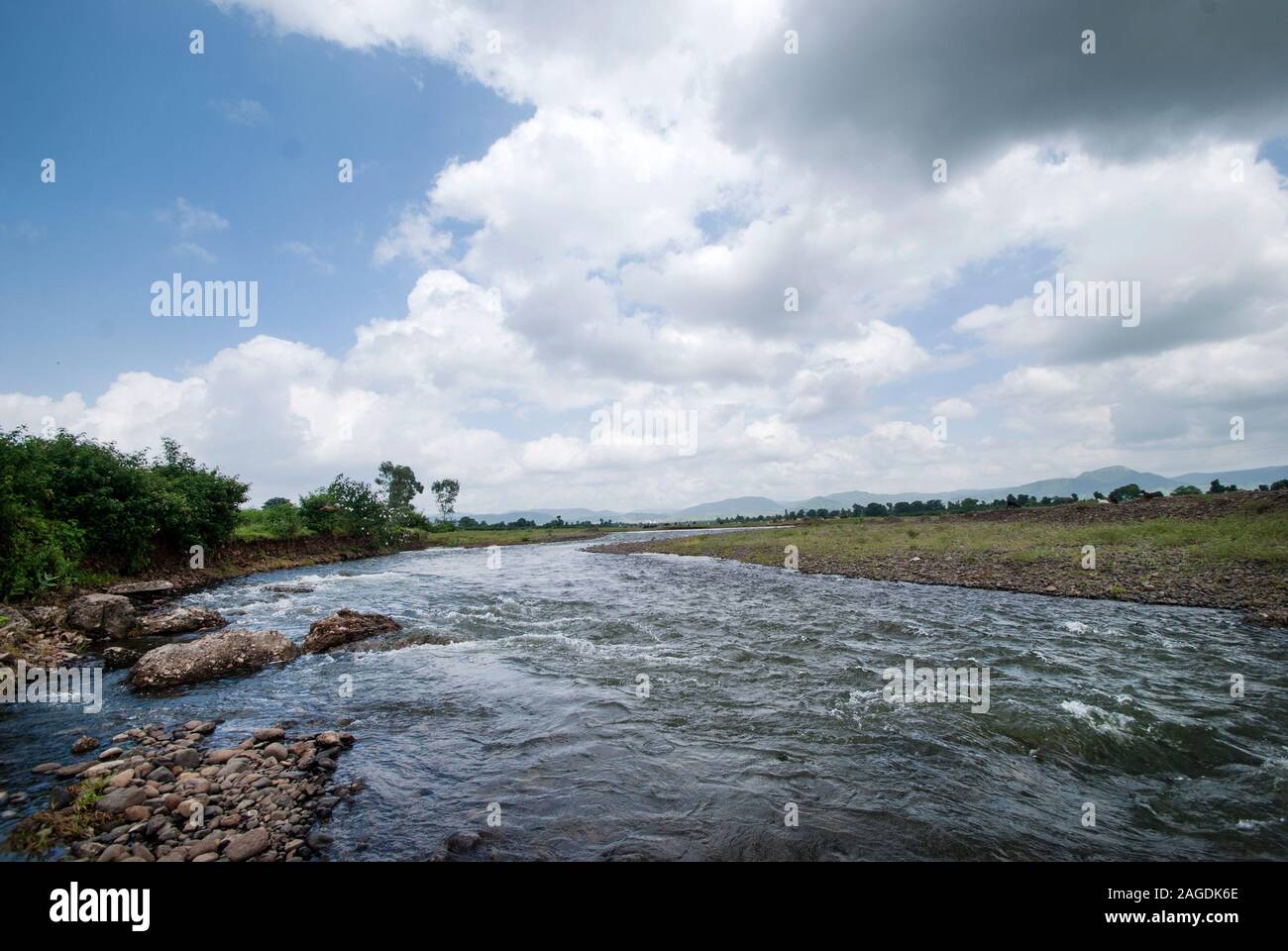 landscape with mountains trees and a river in front Stock Photo - Alamy