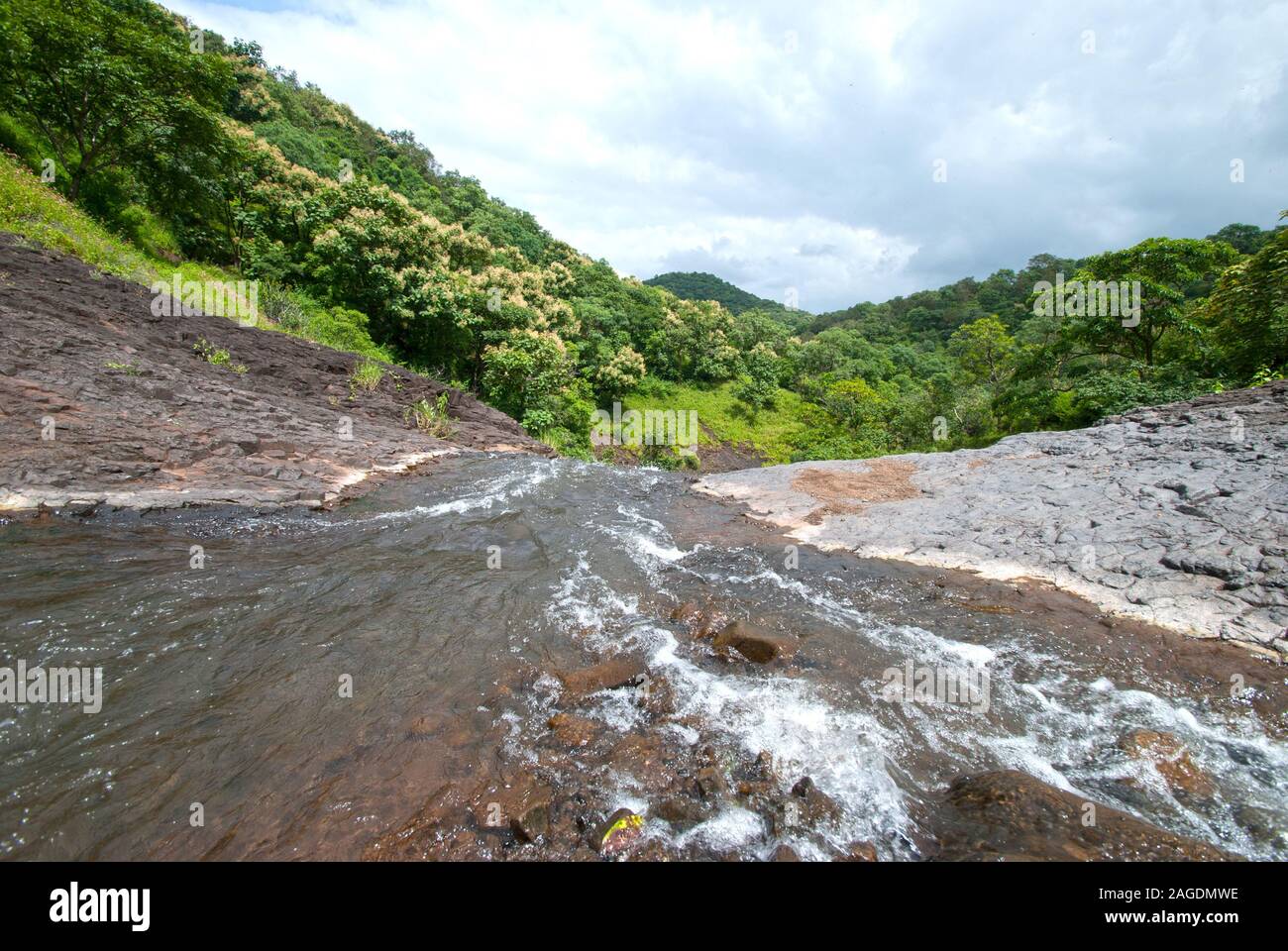 landscape with mountains trees and a river in front Stock Photo - Alamy