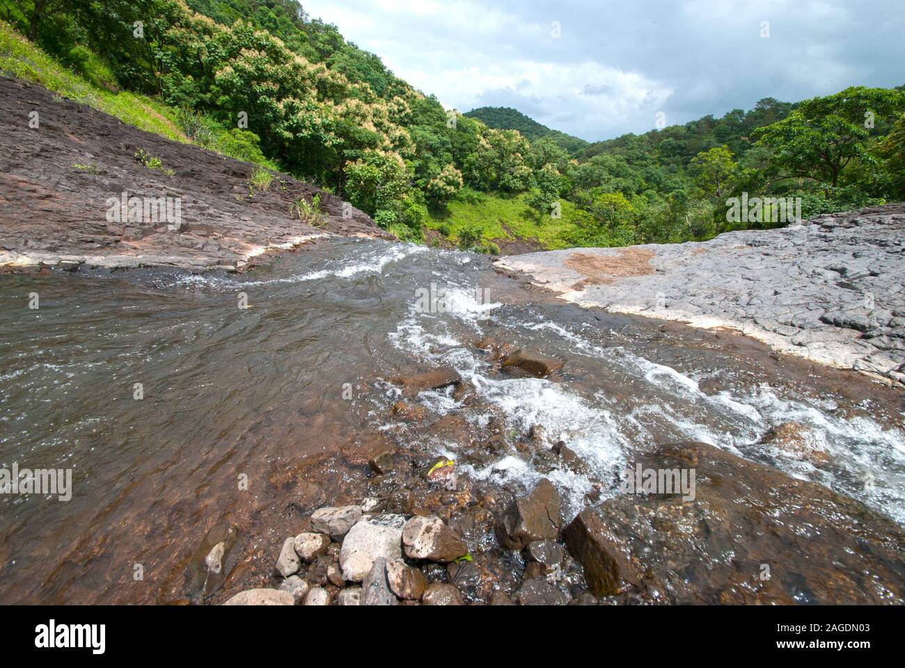landscape with mountains trees and a river in front Stock Photo - Alamy