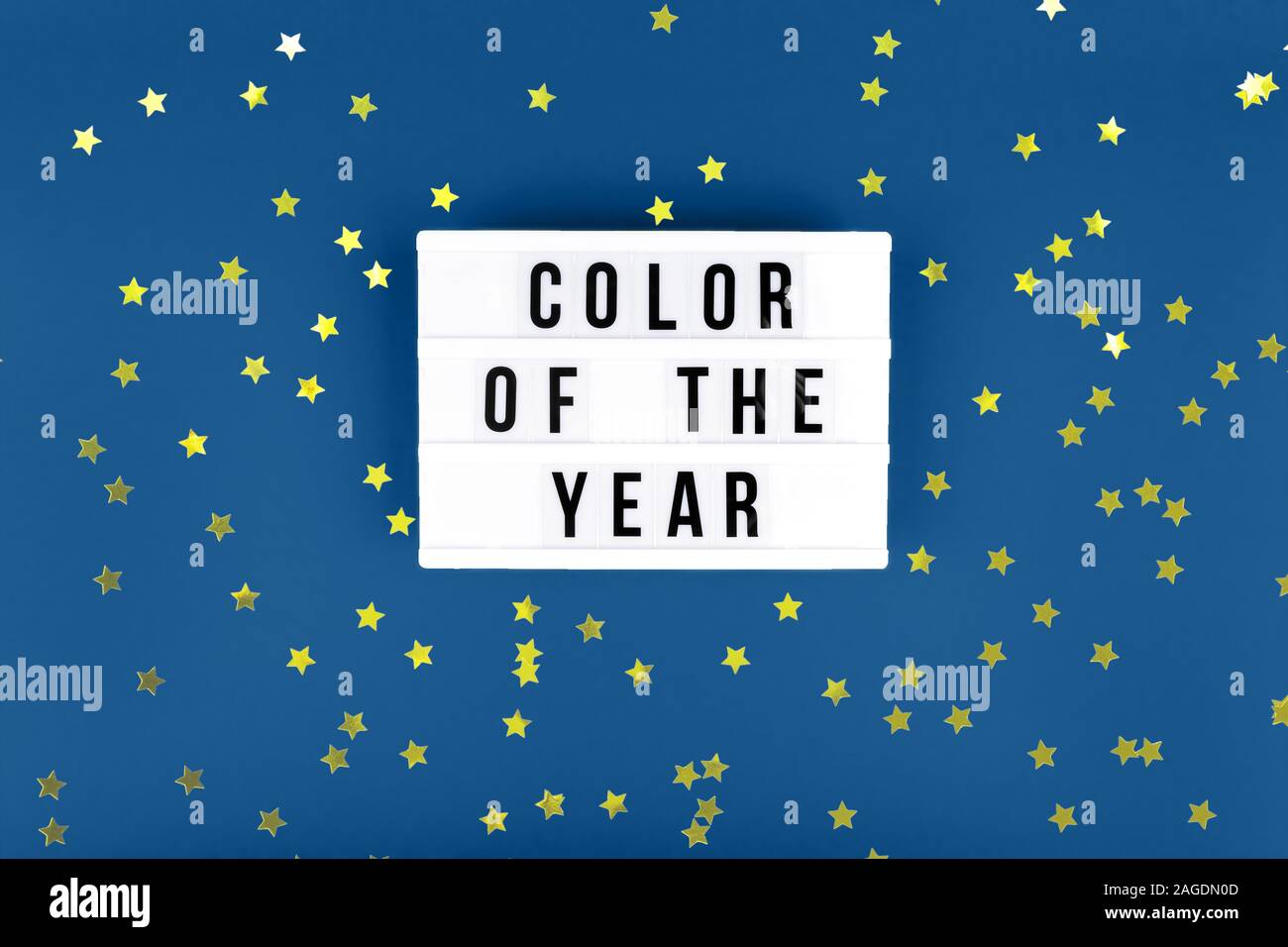 Retro lightbox with Color of the year wording on the trendy solid blue ...