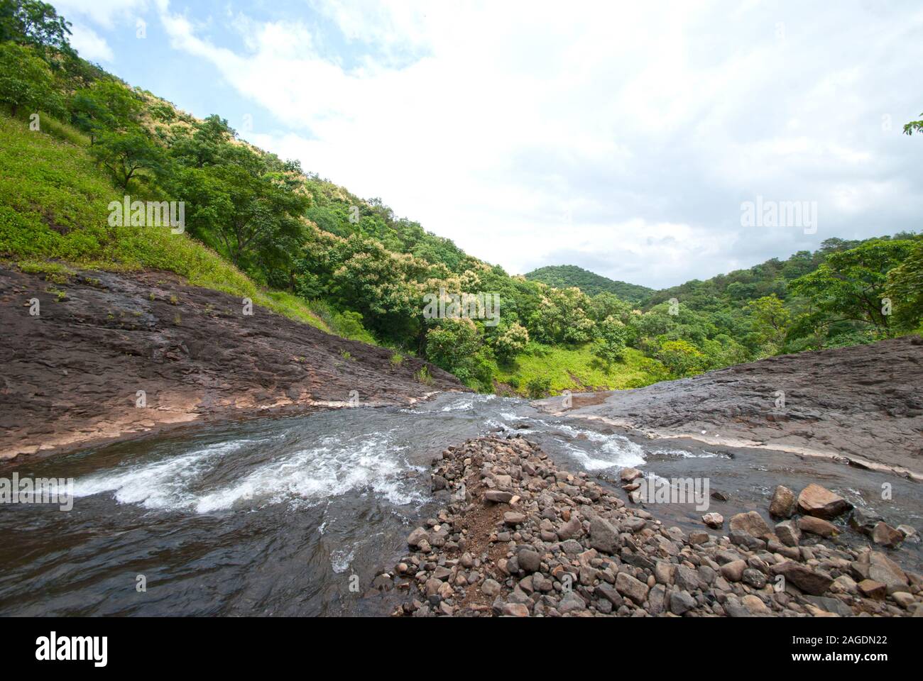 landscape with mountains trees and a river in front Stock Photo - Alamy