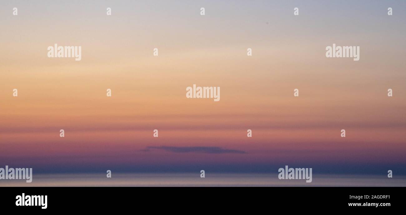 Sky with beautiful warm colors creating the perfect sunset scenery ...