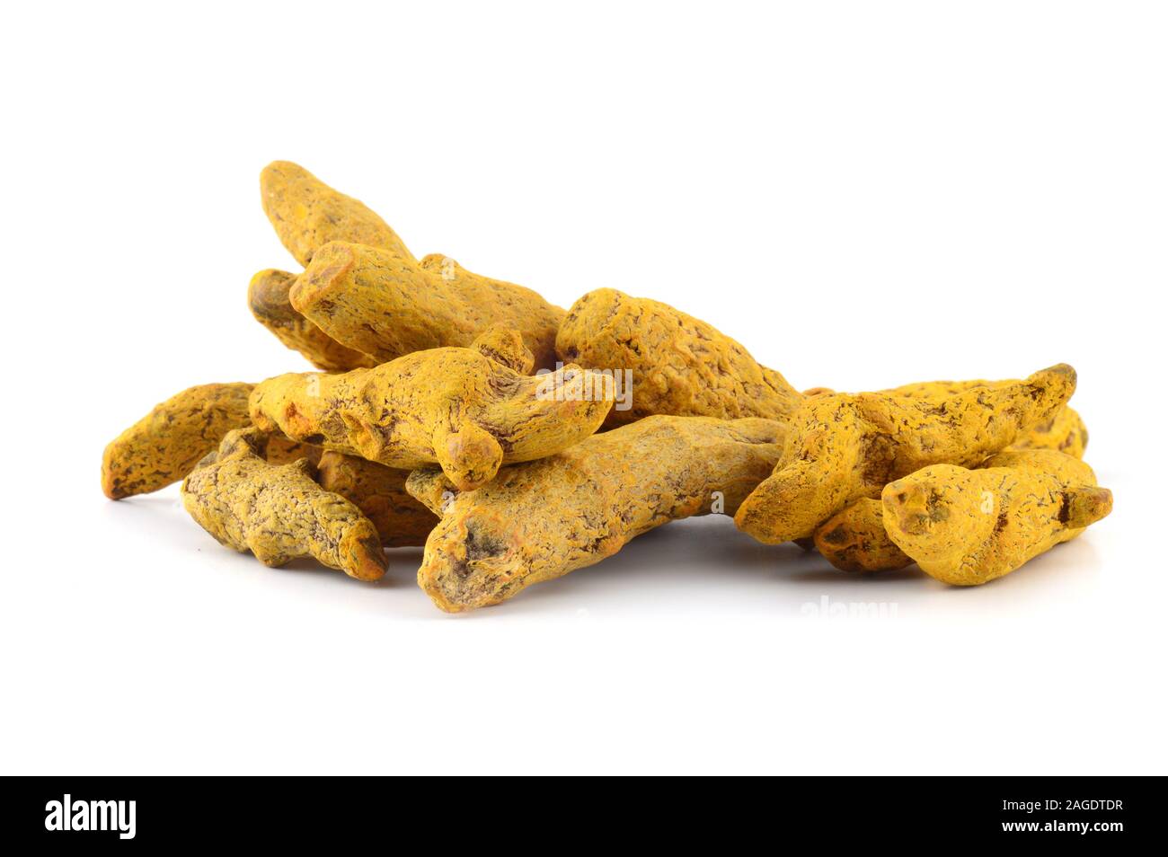 Dry Turmeric roots or barks isolated on white background Stock Photo ...