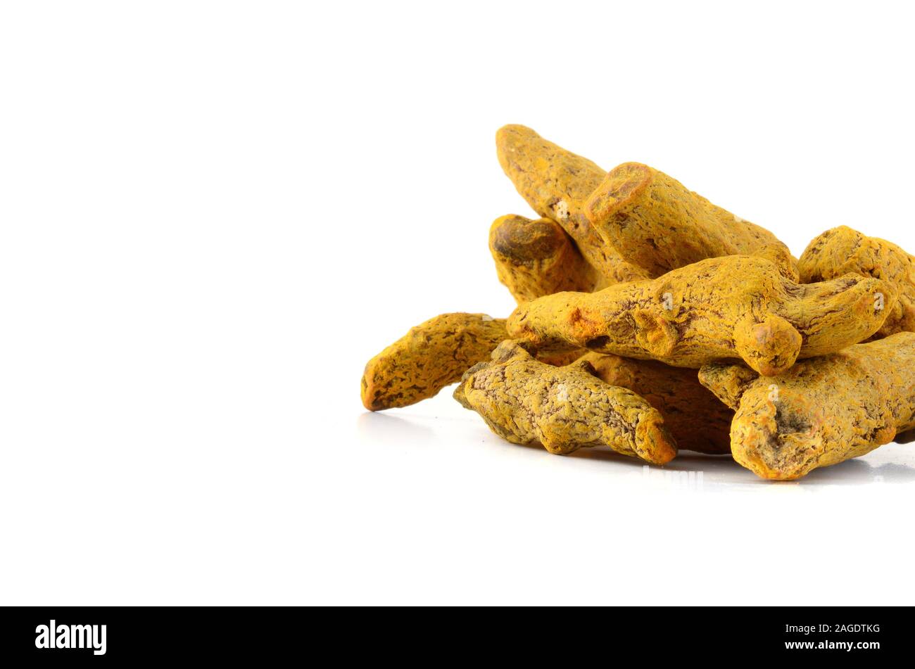 Dry Turmeric roots or barks isolated on white background Stock Photo ...