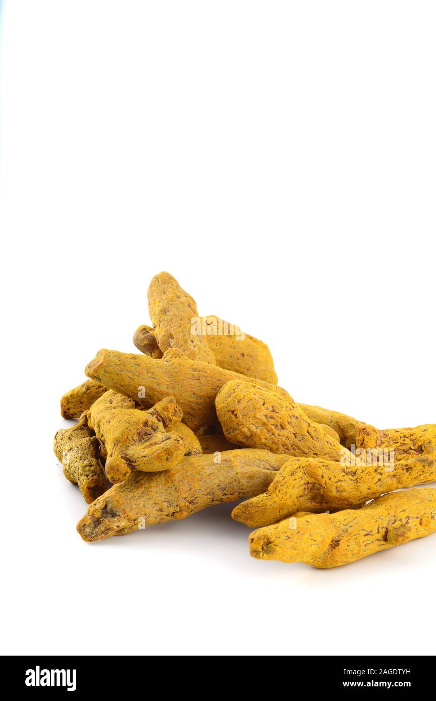 Dry Turmeric roots or barks isolated on white background Stock Photo ...