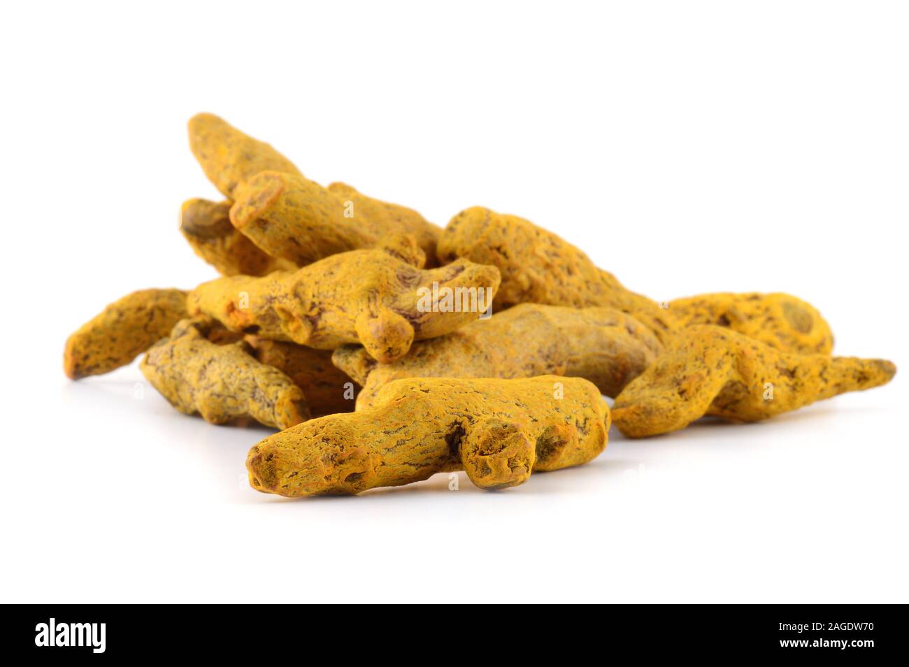 Dry Turmeric roots or barks isolated on white background Stock Photo ...