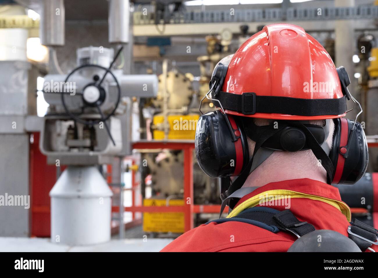 Engineer with helmet coverall hi-res stock photography and images - Alamy