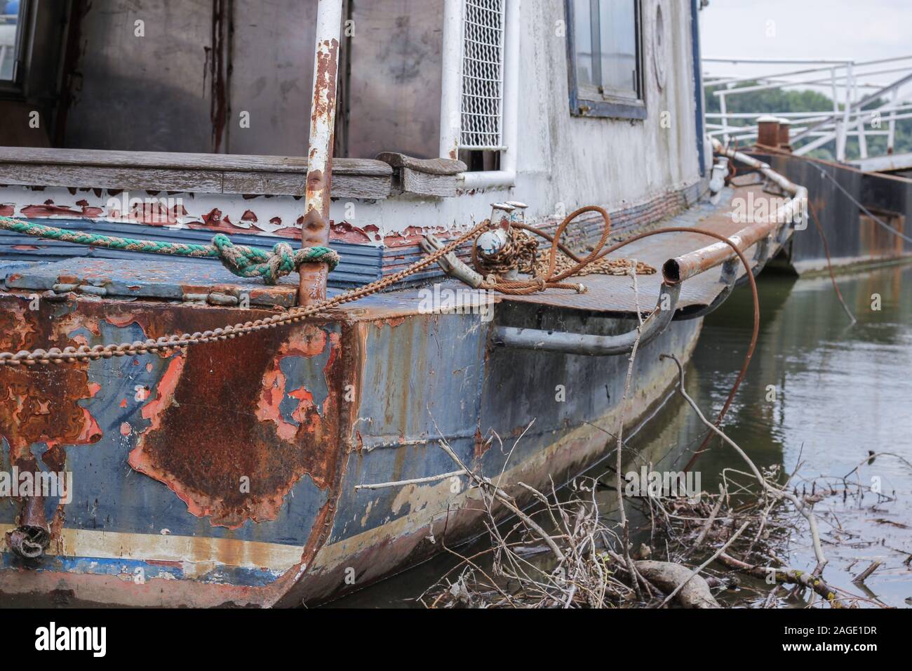 Abandoned rusty ship on the sea during daytime Stock Photo - Alamy