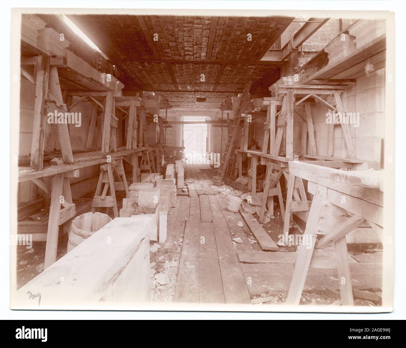 Interior work : construction of a hallway.; Interior work ...