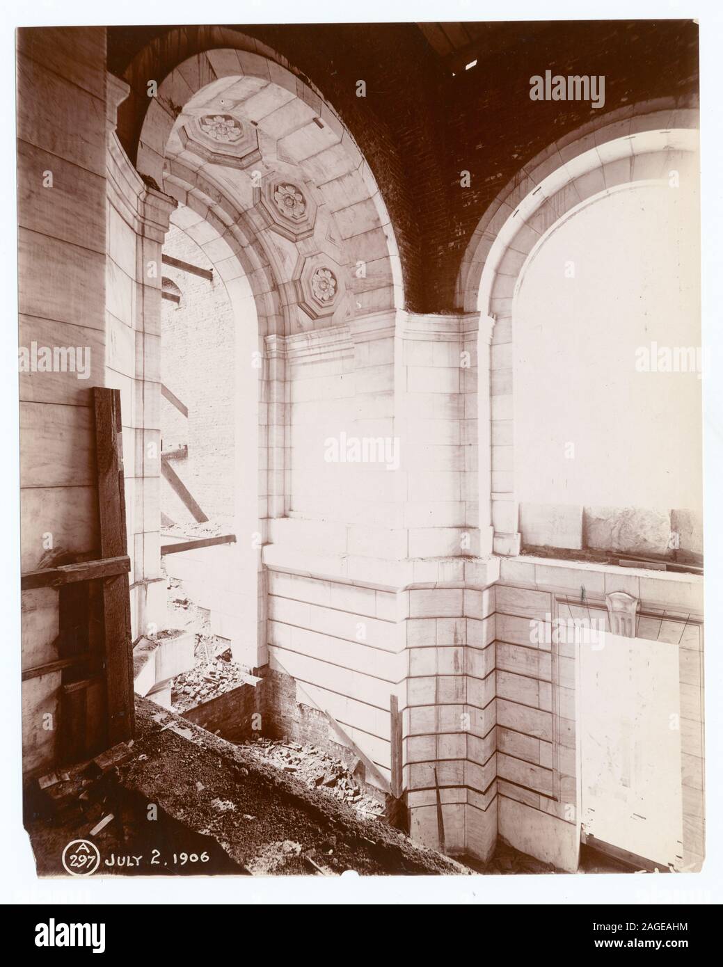 Interior work : decorated arch above the initial construction of a ...