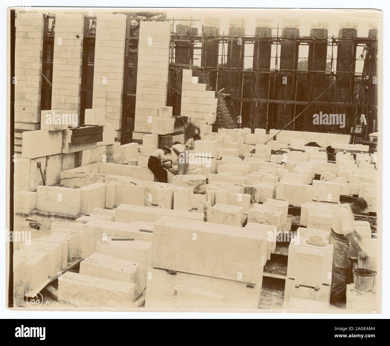 Interior work : marble blocks, and construction of west wall.; Interior ...