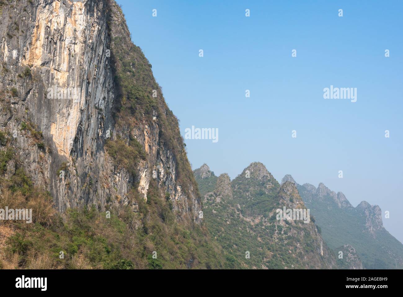 Karst formation and foggy limestone mountain landscape between Guiling ...