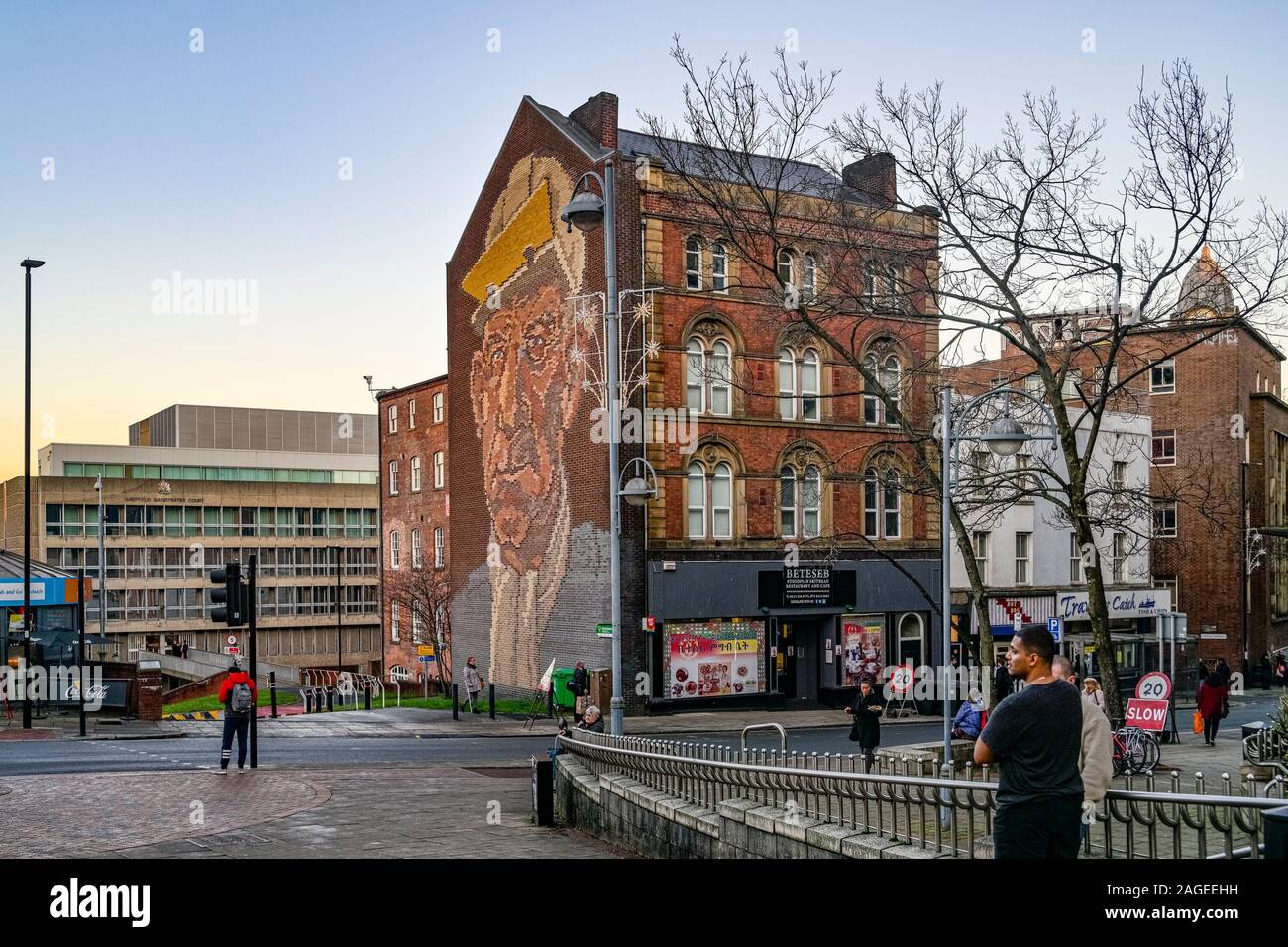 30,000 bricks, of various colors, form image of a steelworker, artist ...
