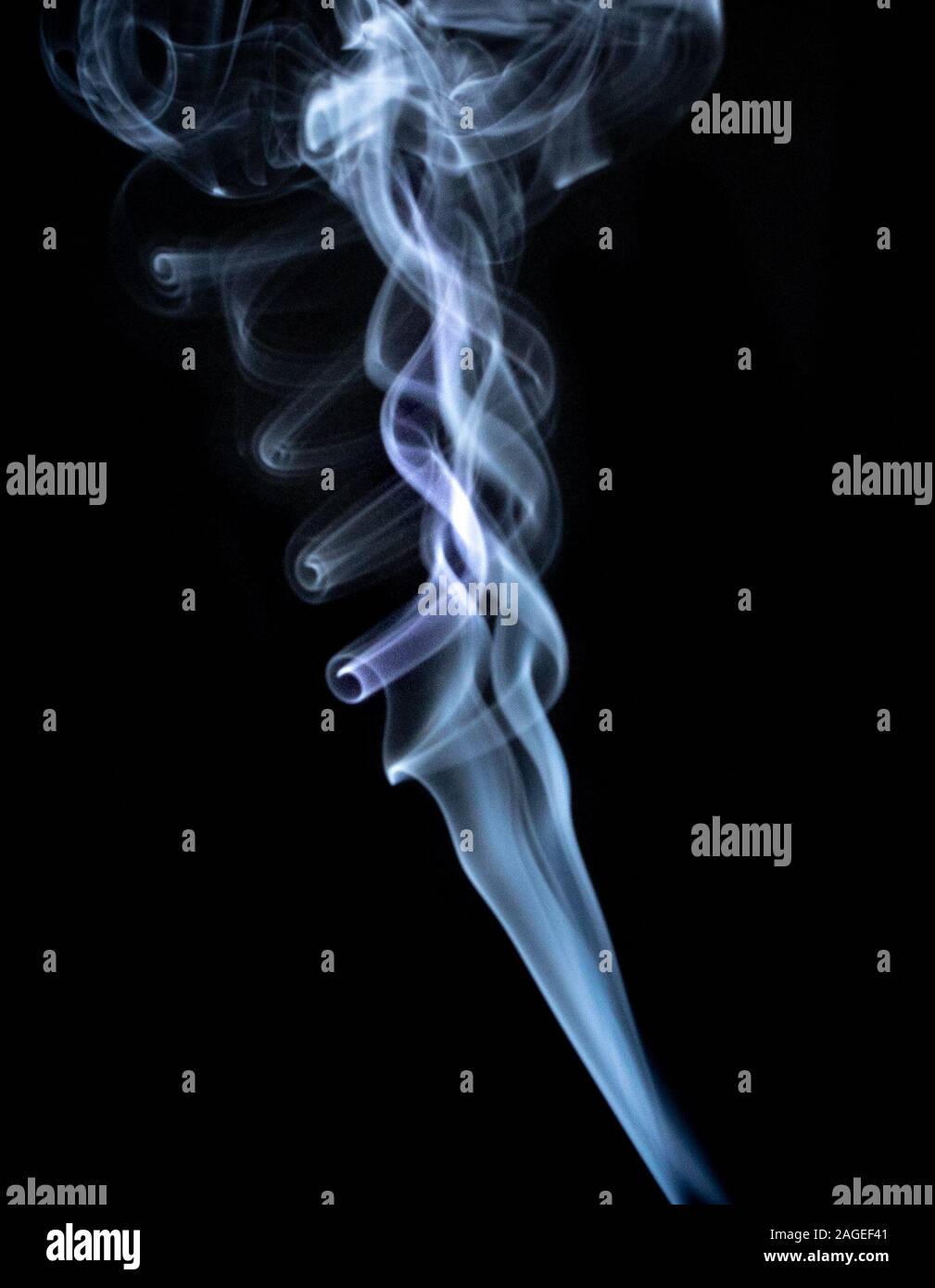 Realistic shot of a wisp of smoke against a black background - great ...