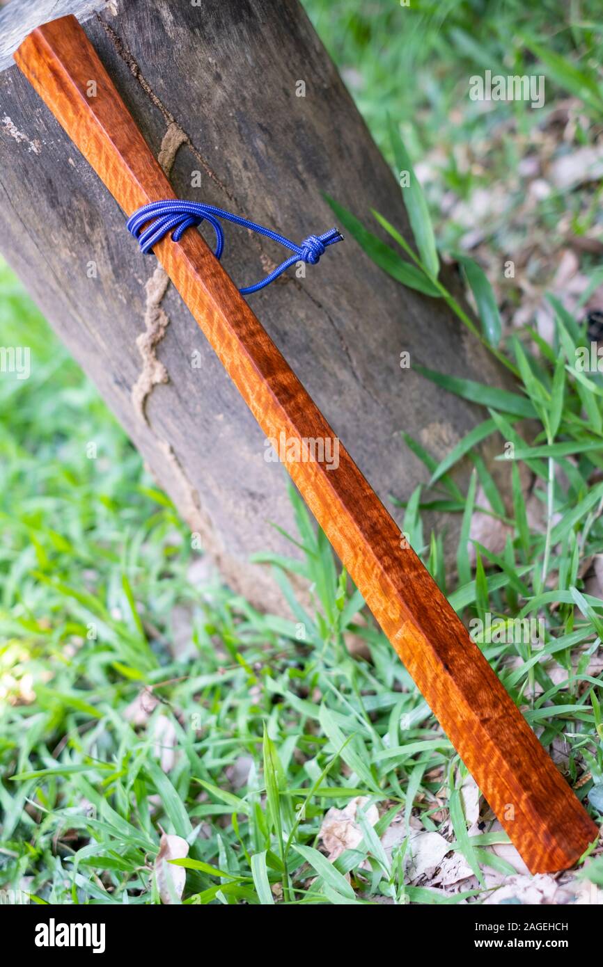 KomFaek wood baton is weapon Thailand ancient Stock Photo - Alamy