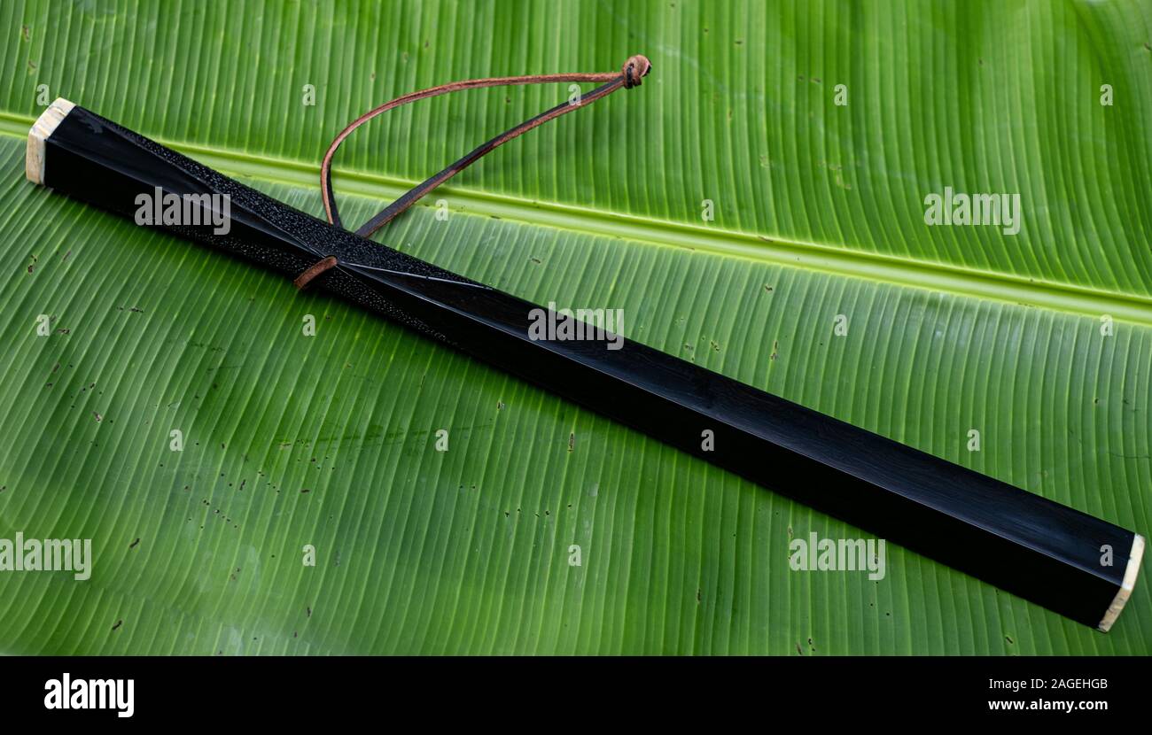 KOMFAEK wood baton is weapon Thailand ancient Stock Photo - Alamy