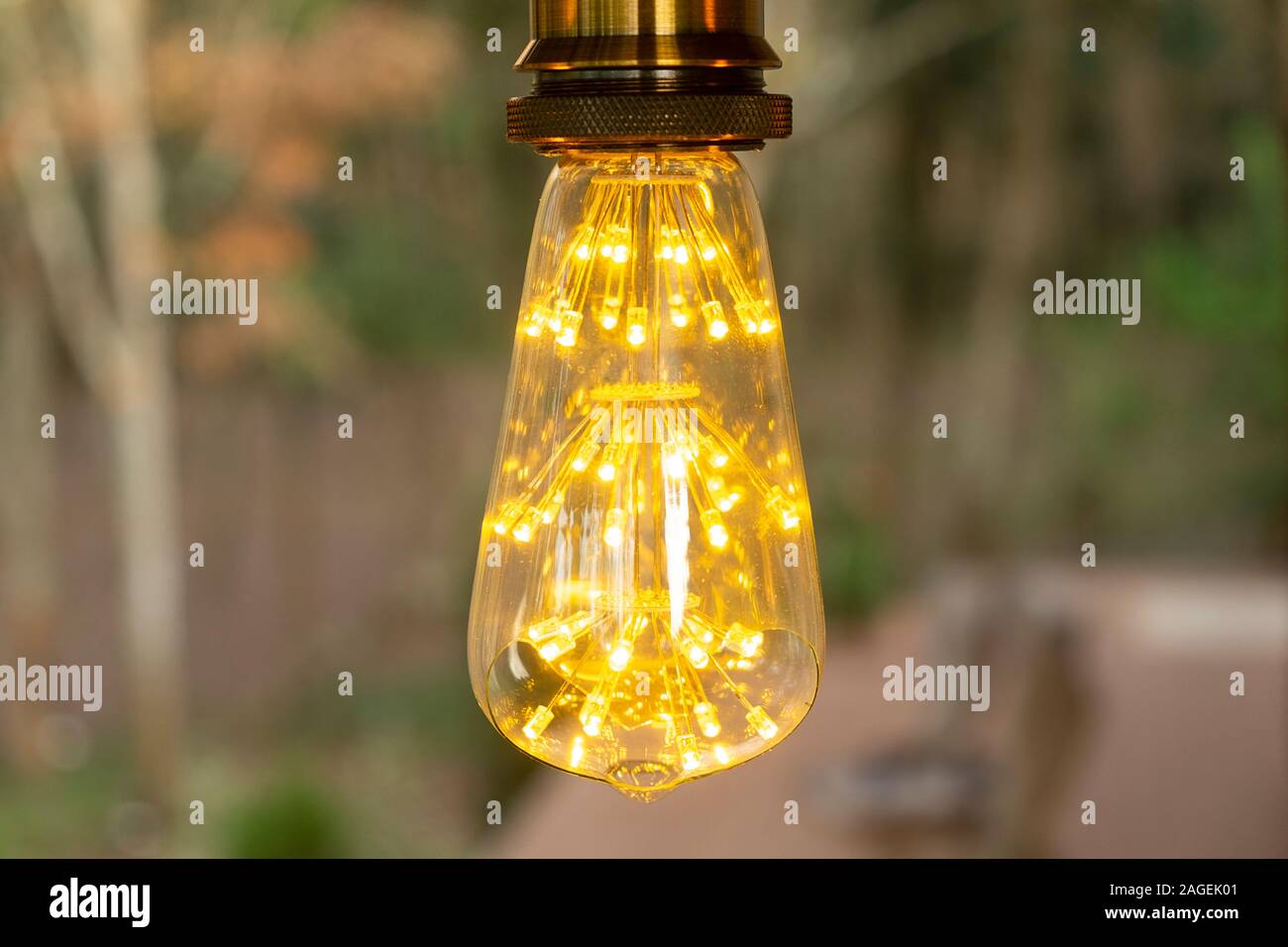 Classic retro incandescent led electric lamp warm white on blur ...