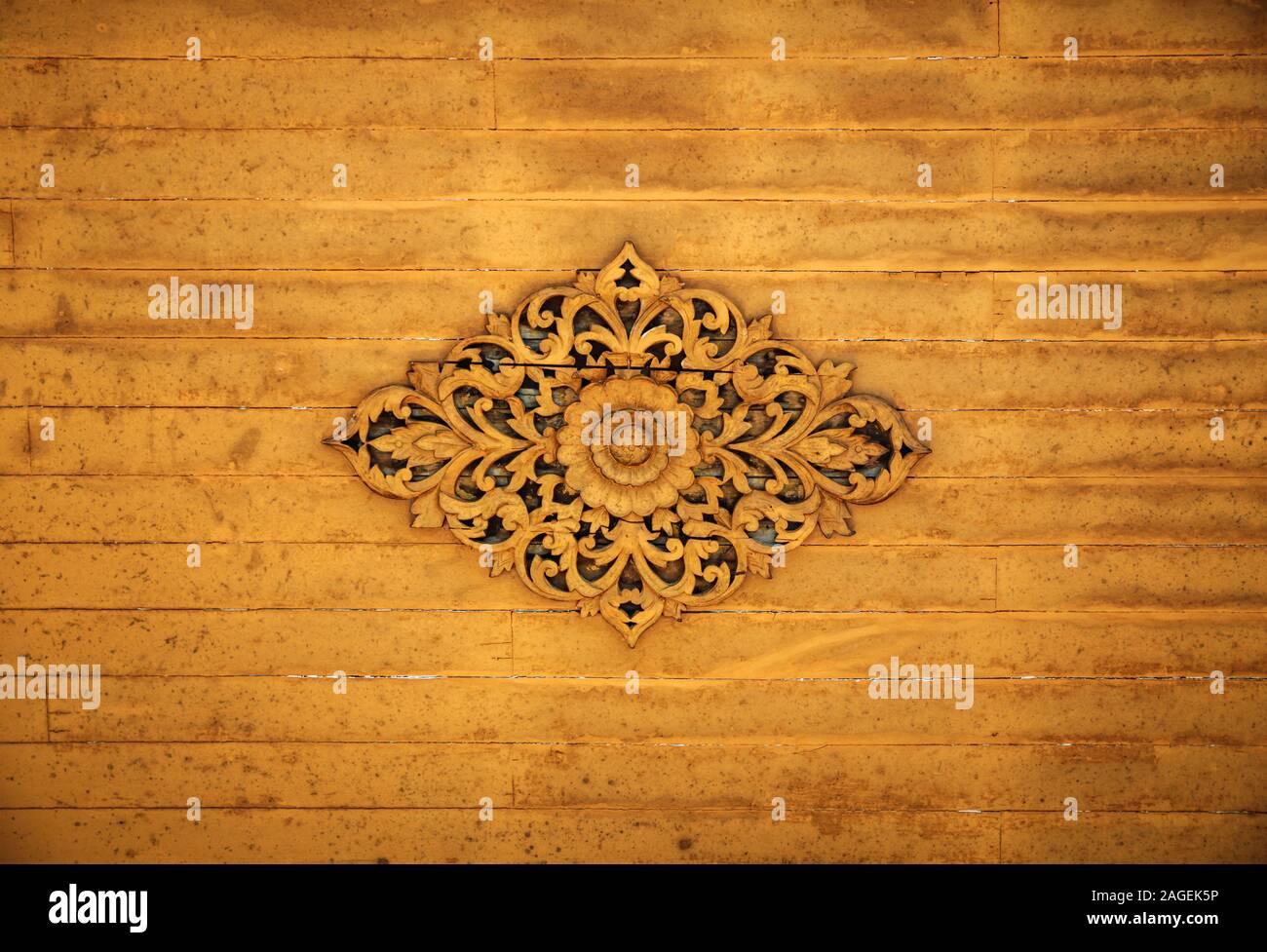 Brown floral carving on the wooden wall in Yangon, Myanmar Stock Photo ...
