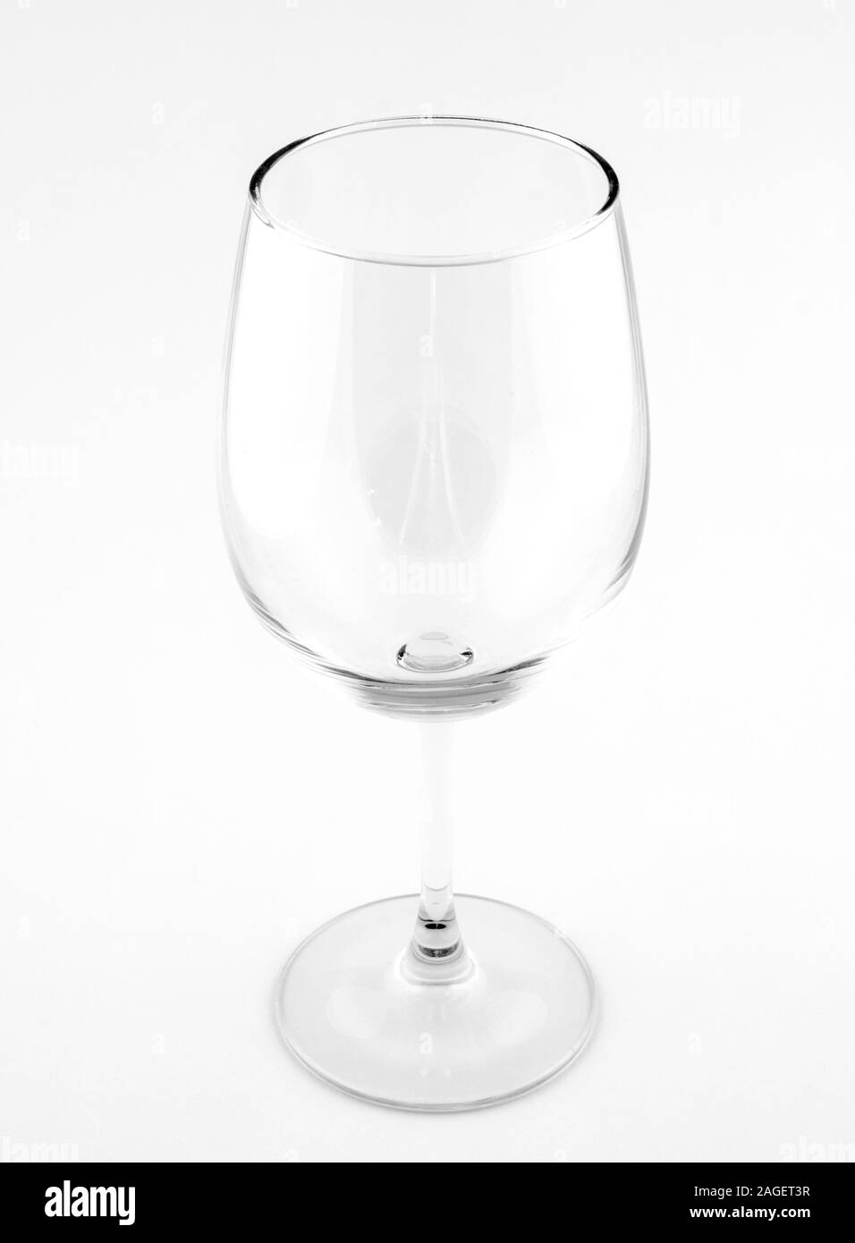Empty wine glass white isolated Stock Photo - Alamy