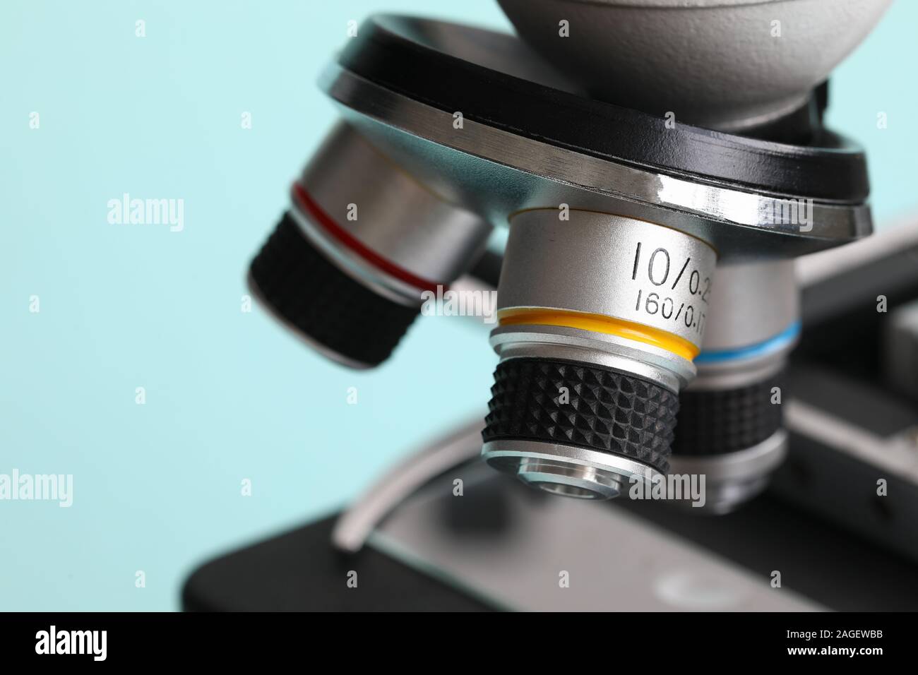 Chemistry microscope on modern blue background Stock Photo - Alamy