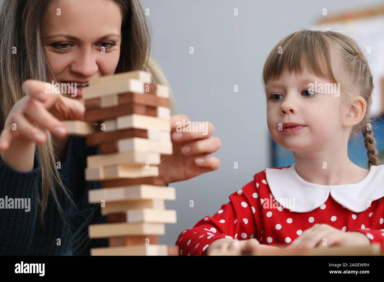 Mum gaming with daughter Stock Photo - Alamy