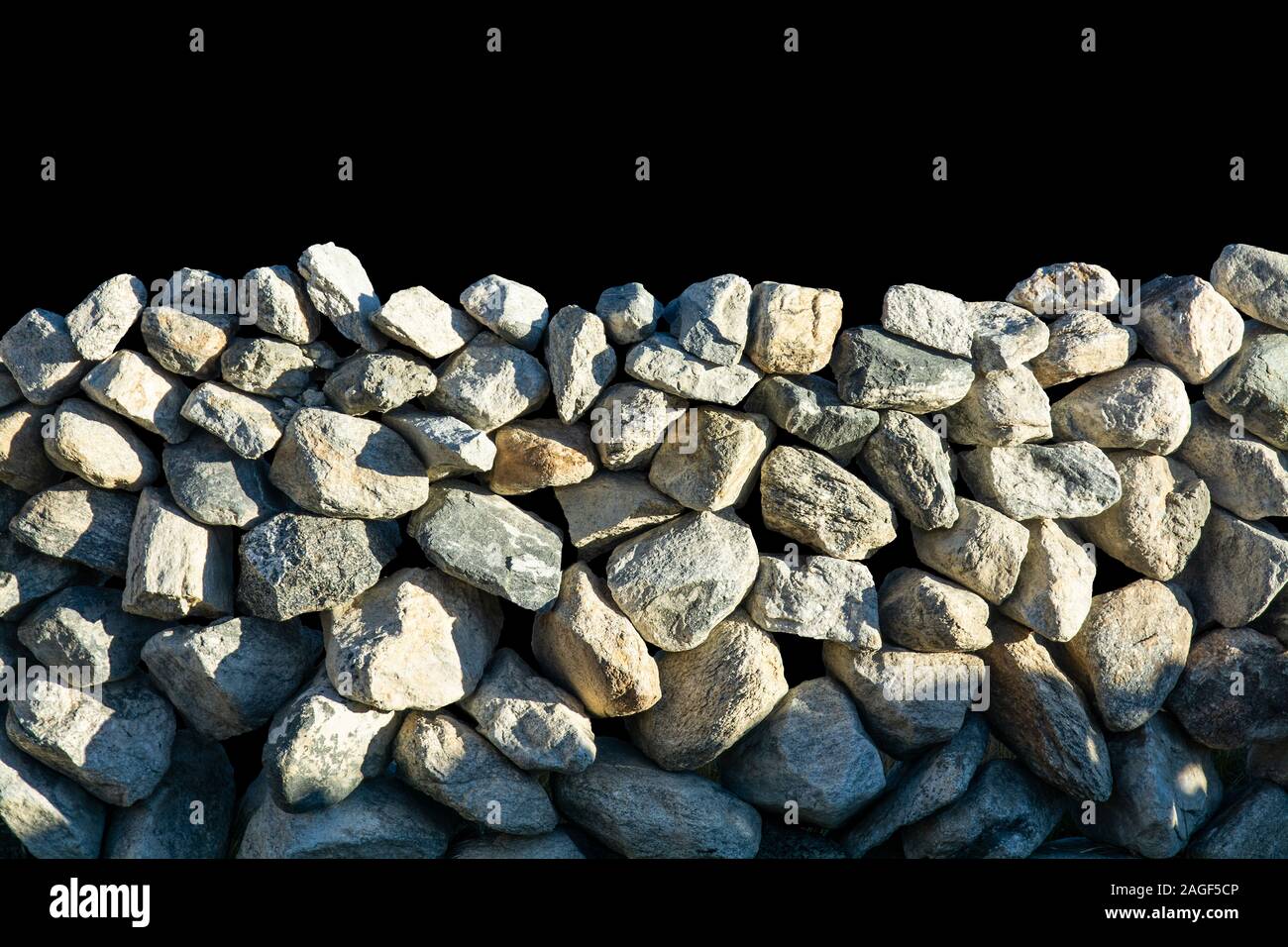 rock isolated on black background Stock Photo - Alamy