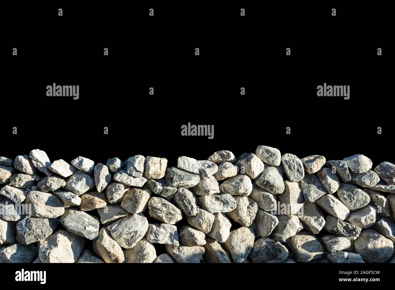 rock isolated on black background Stock Photo - Alamy