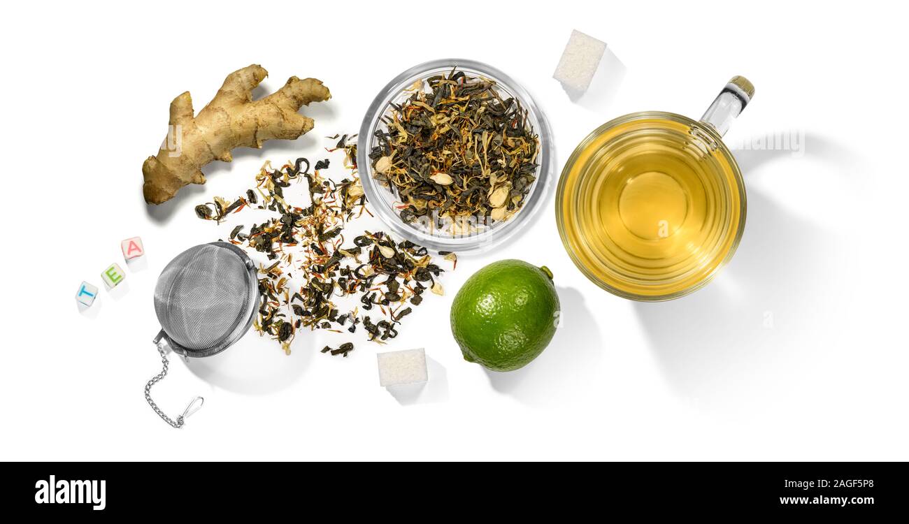 Green tea with aromatic additives and accessories. Top view on white ...