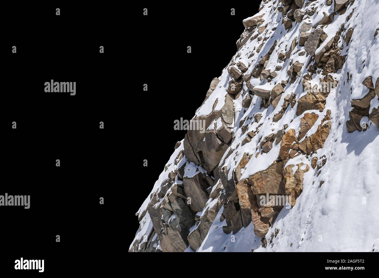 rock isolated on black background Stock Photo - Alamy