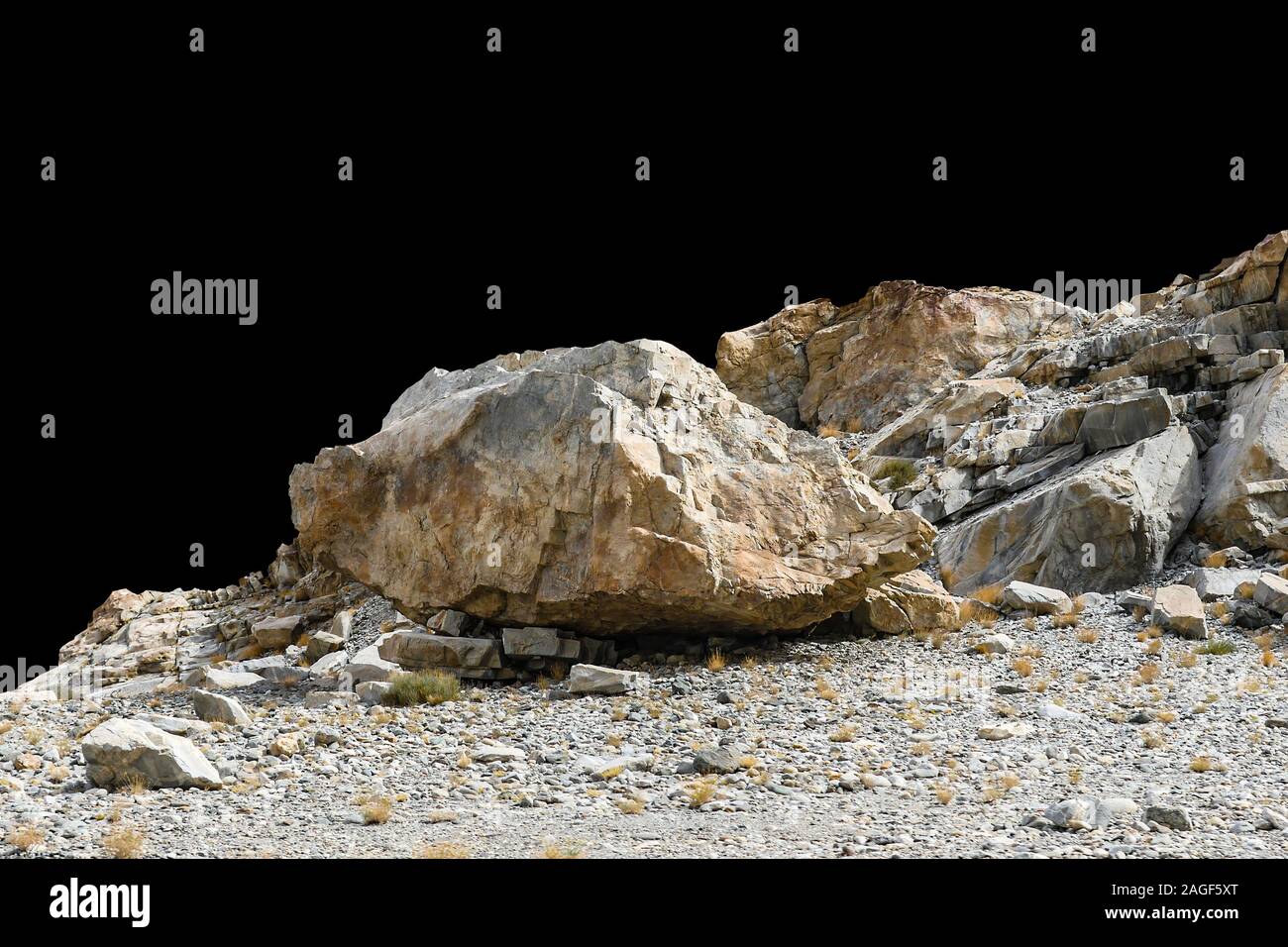 rock isolated on black background Stock Photo - Alamy