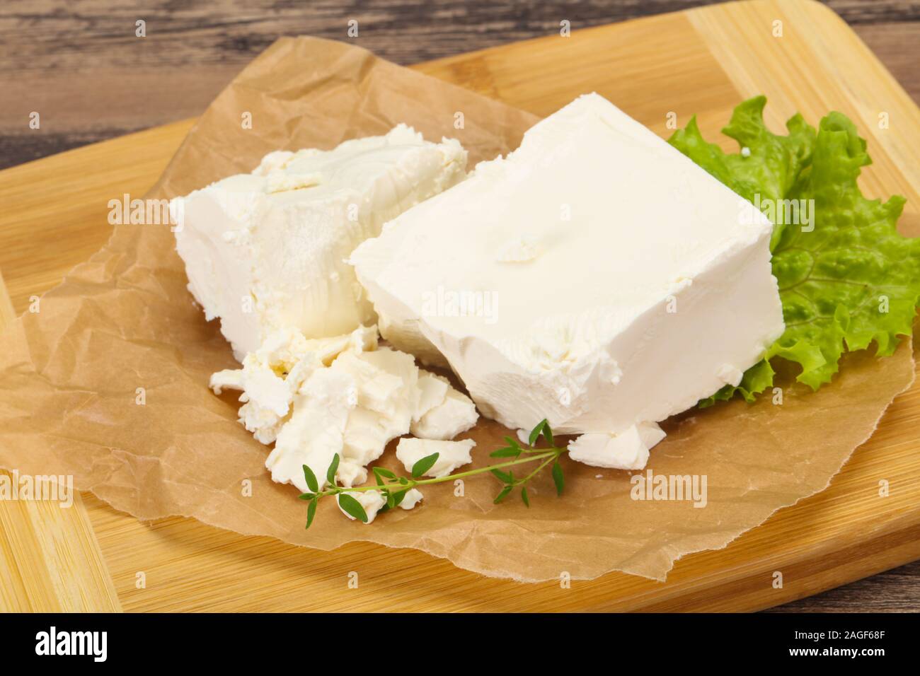 Greek traditional Feta soft cheese in the plate Stock Photo - Alamy