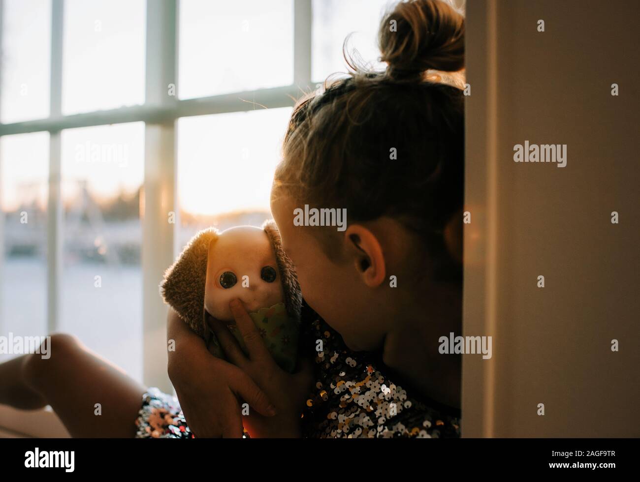Child cuddling toy hi-res stock photography and images - Alamy
