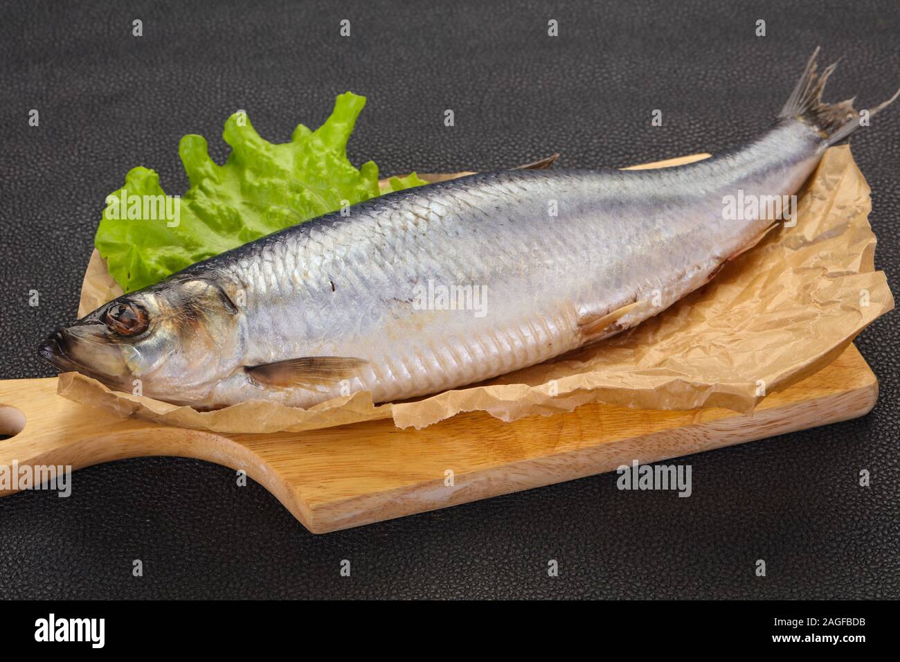 Salted herring fish ready for eat Stock Photo - Alamy