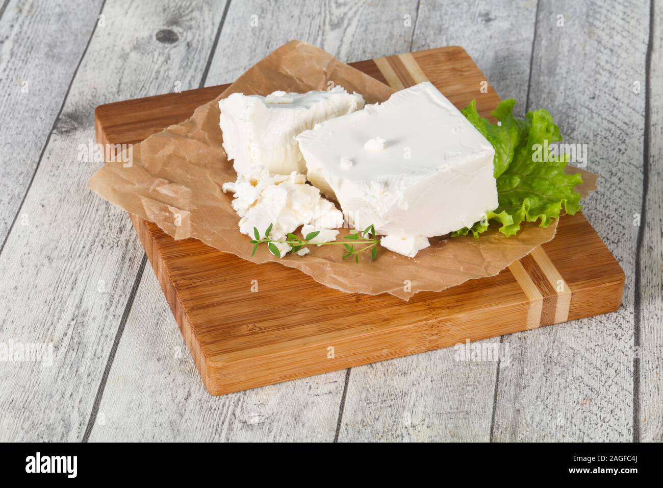 Greek traditional Feta soft cheese in the plate Stock Photo - Alamy