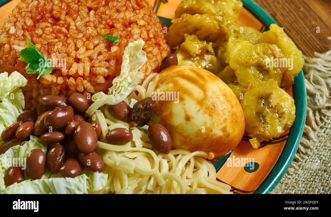 Waakye, Ghanaian cuisine, cooked rice and beans, mixed with boiled eggs ...