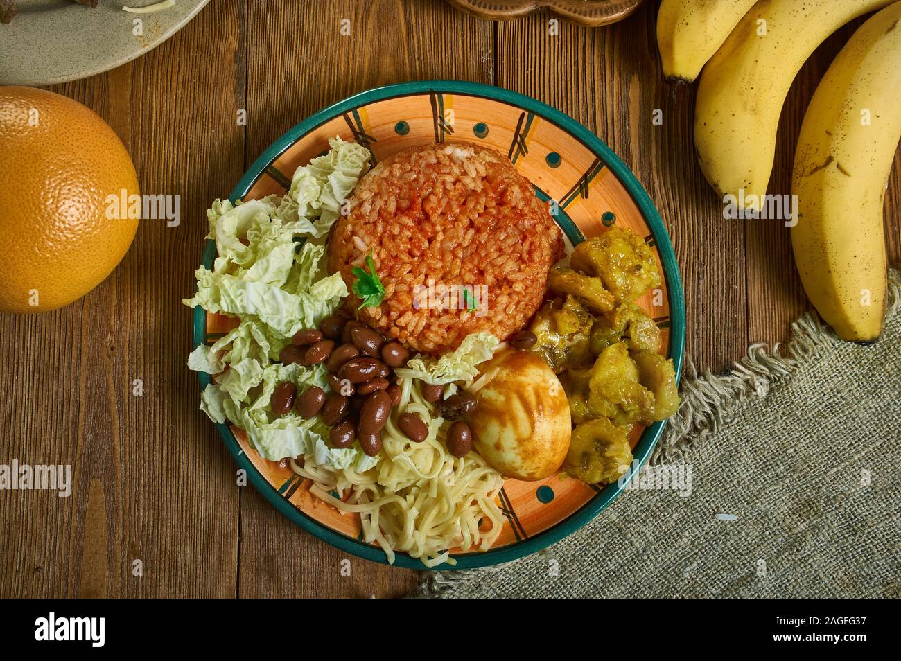 Waakye, Ghanaian cuisine, cooked rice and beans, mixed with boiled eggs ...