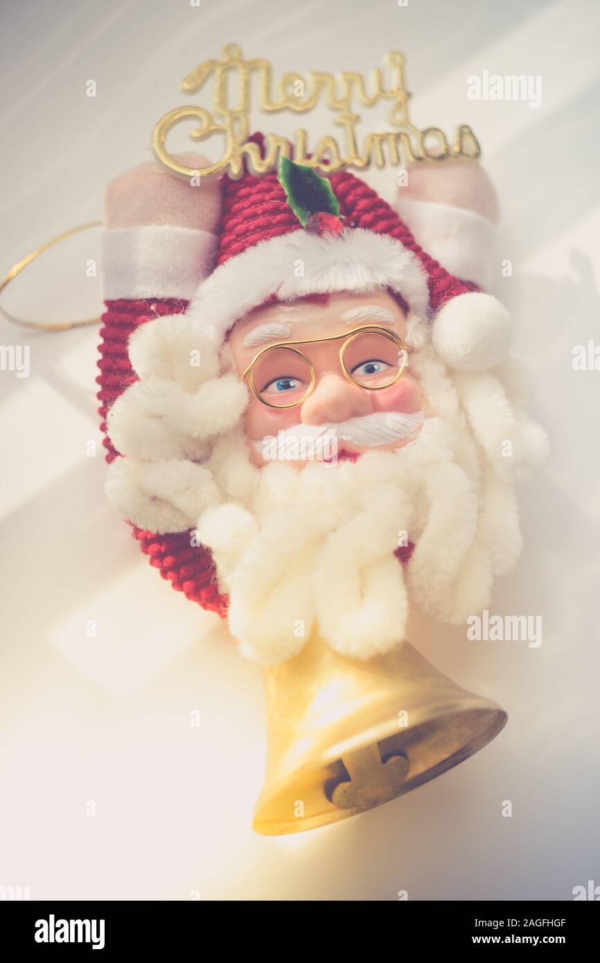 Golden bell santa hi-res stock photography and images - Alamy