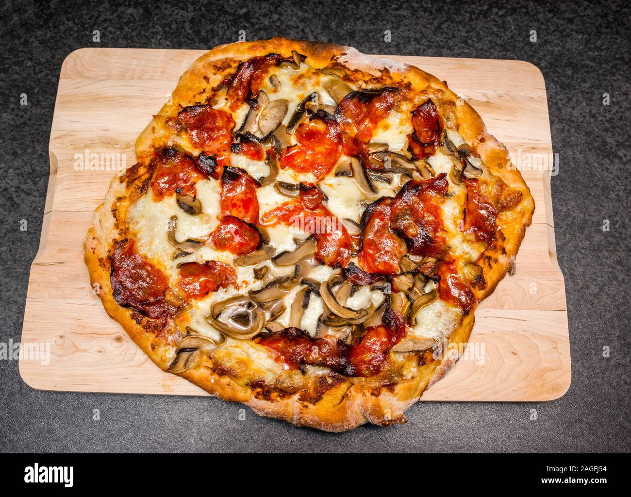 Topping pizza hi-res stock photography and images - Alamy